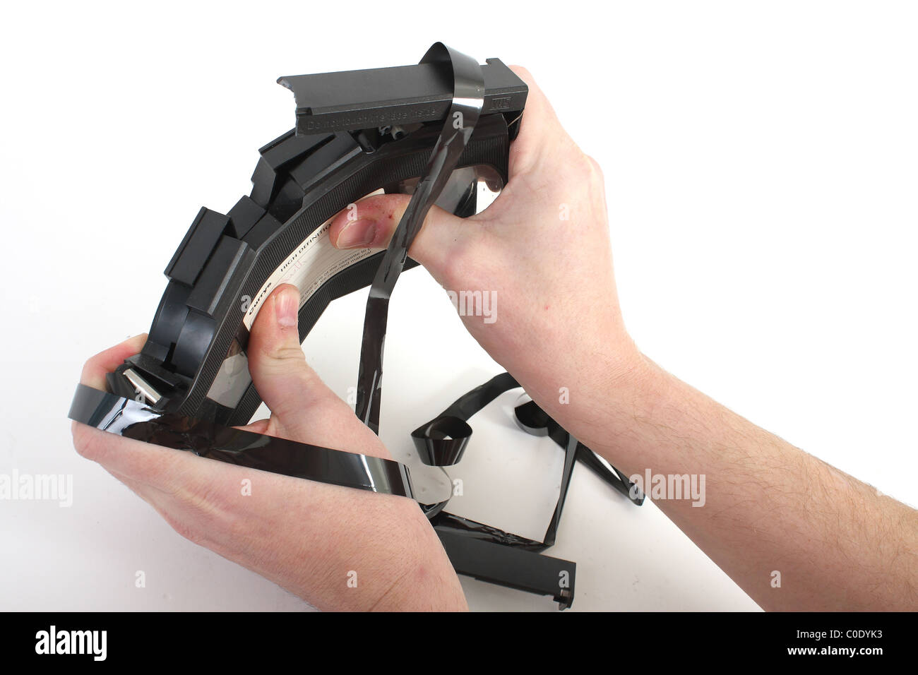 An old VHS video cassette tape blank and being destroyed Stock Photo ...