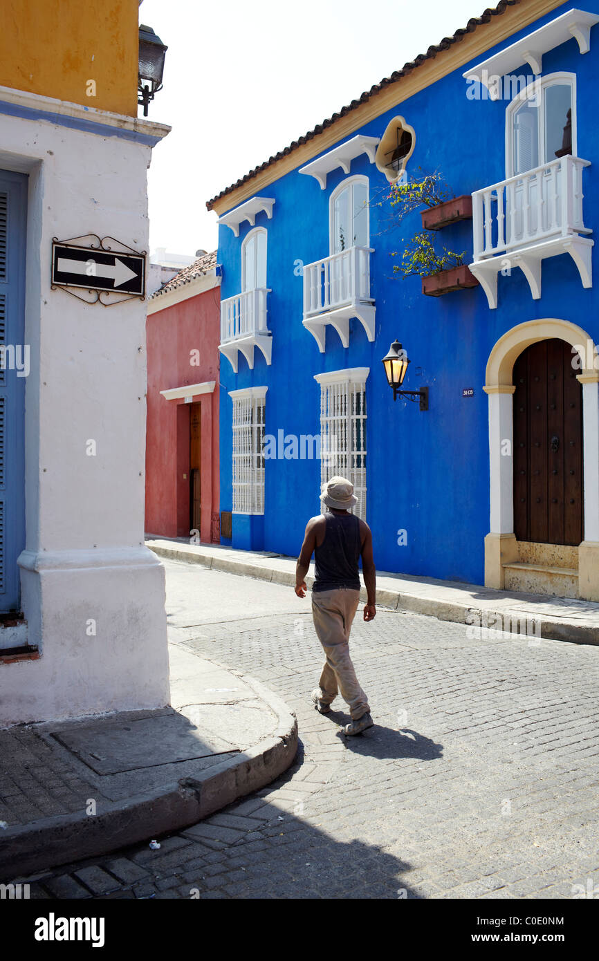 man walking down street Cartagena Colombia Stock Photo - Alamy