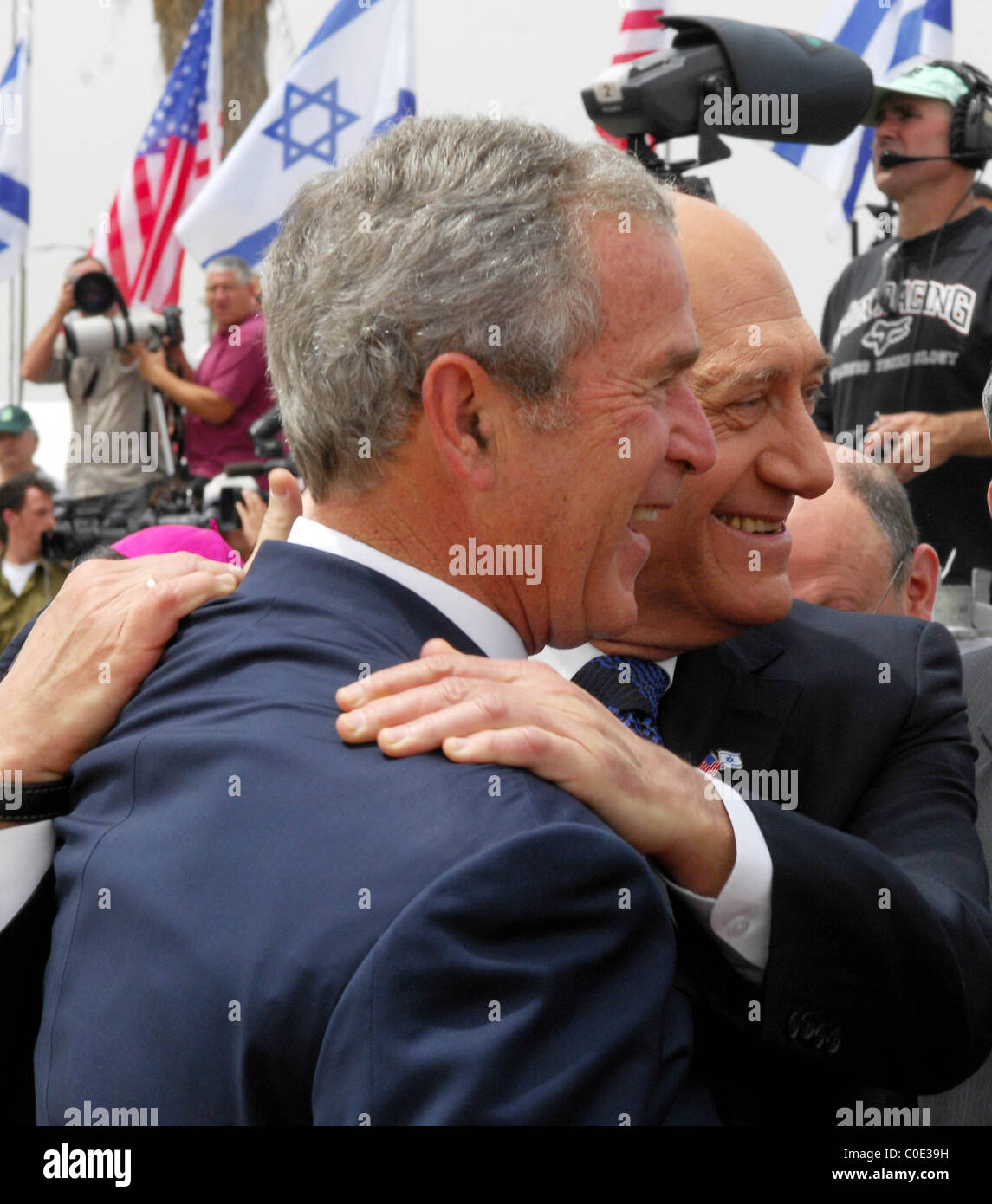George W. Bush President George W. Bush and the First Lady arrive at ...