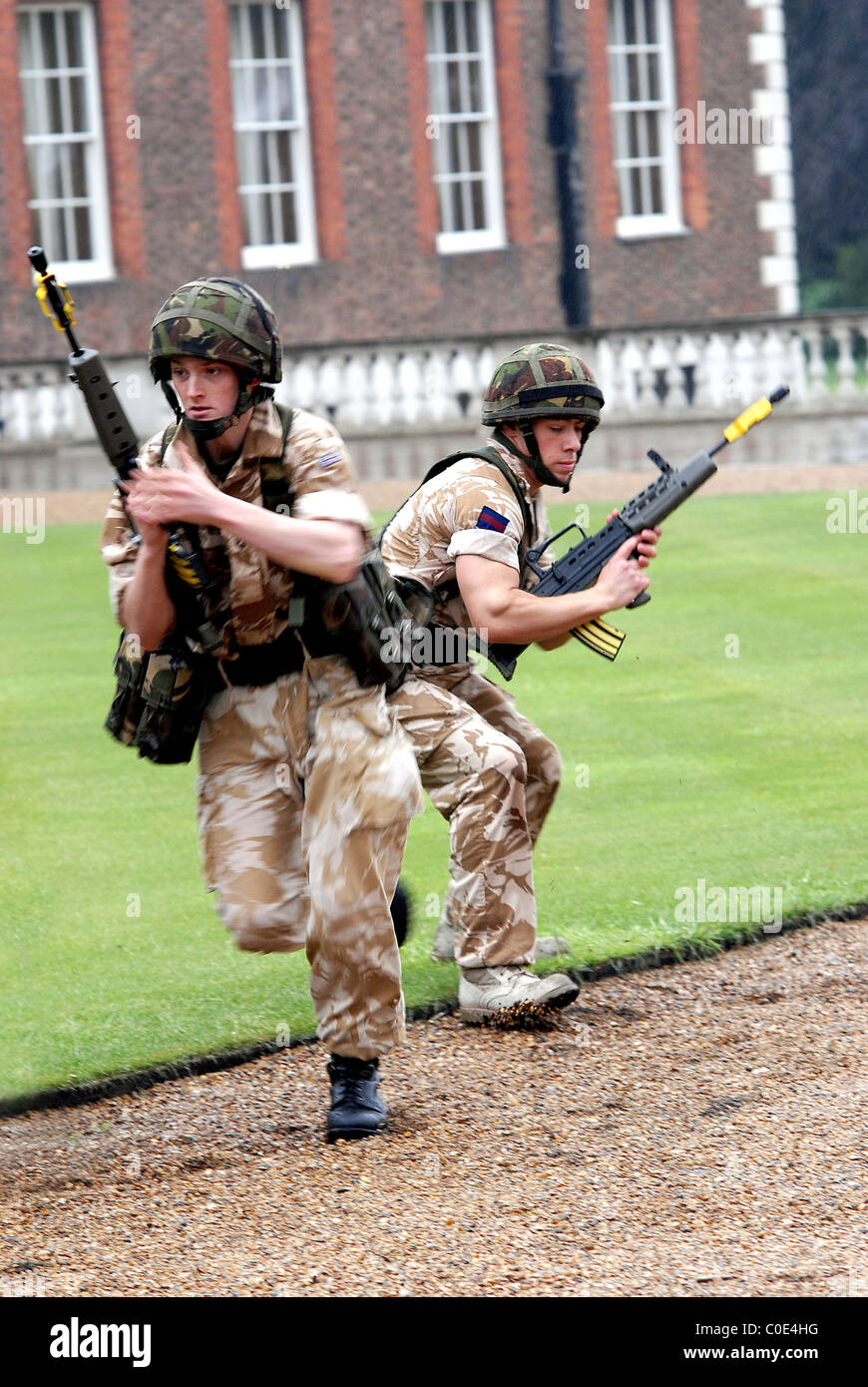 20 Soldiers in full combat gear perform a dress rehearsal of a sequence ...