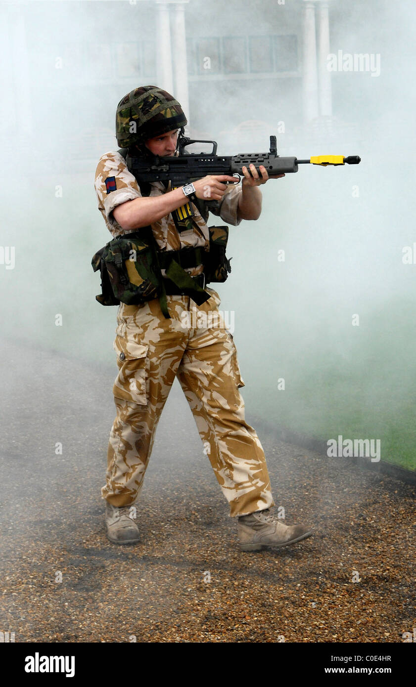 20 Soldiers in full combat gear perform a dress rehearsal of a sequence ...