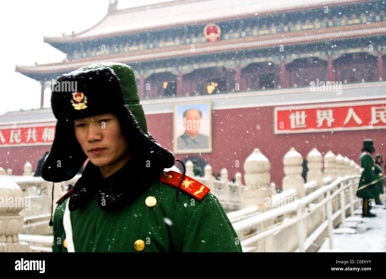 Guard near Mao Zedong portrait in Tiananmen Square Stock Photo - Alamy