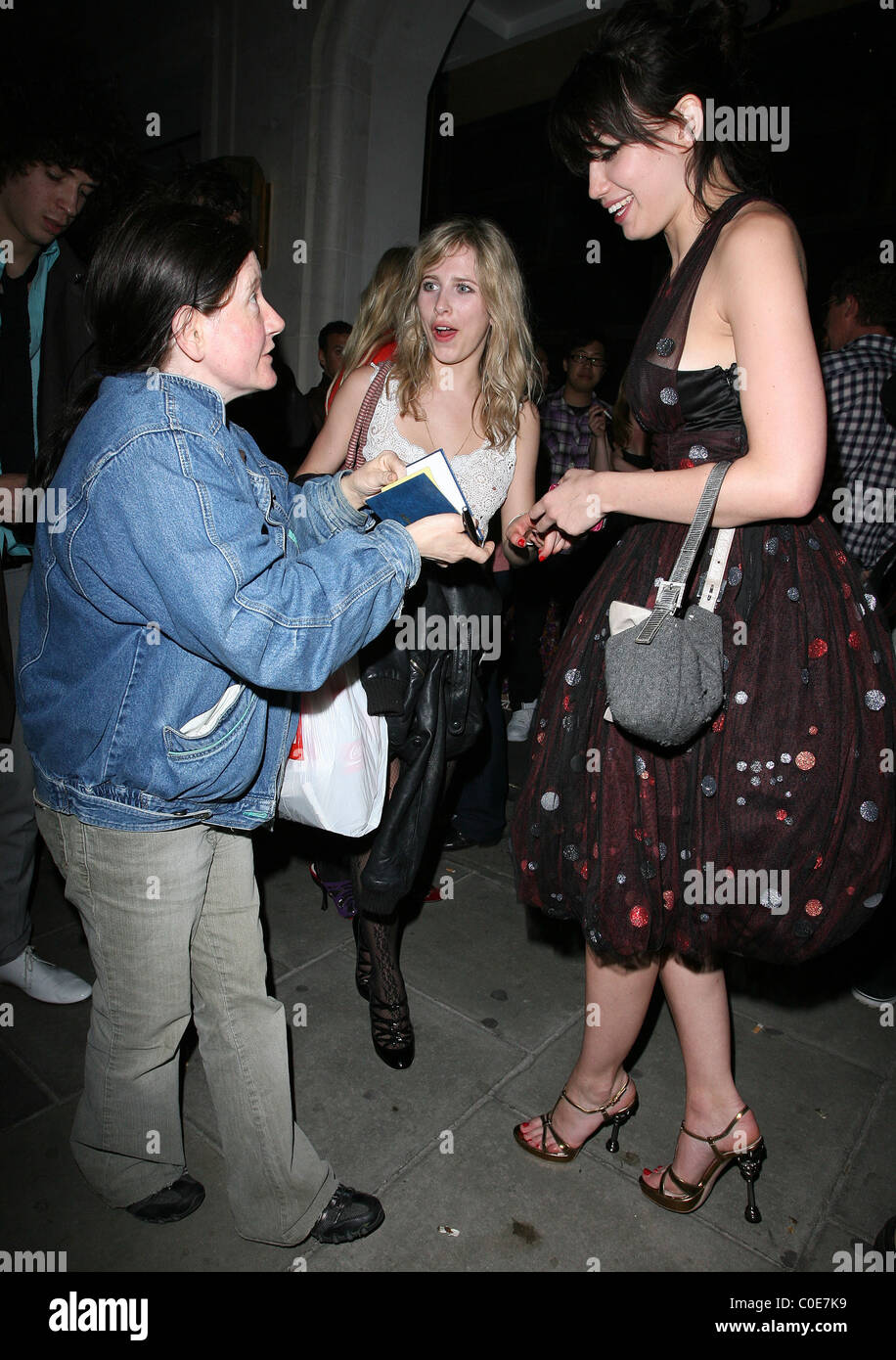 Daisy Lowe signing an autograph Belvedere Vodka Jagger Dagger launch ...
