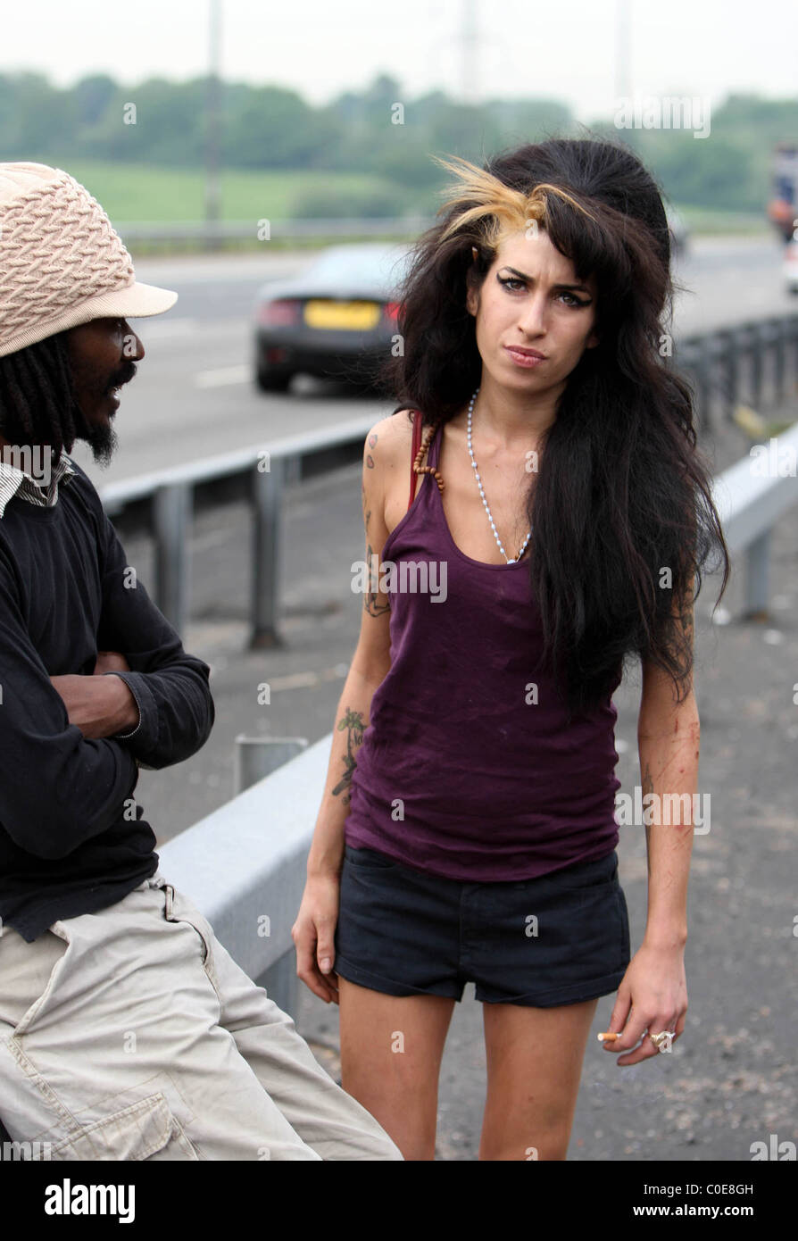 Amy Winehouse goes for a wander on the M40 when the car she is ...