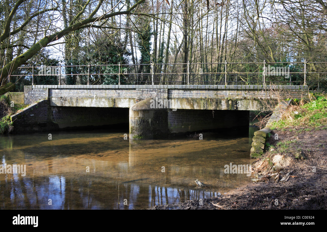 A former railway bridge over the River Tud at Costessey, Norfolk ...
