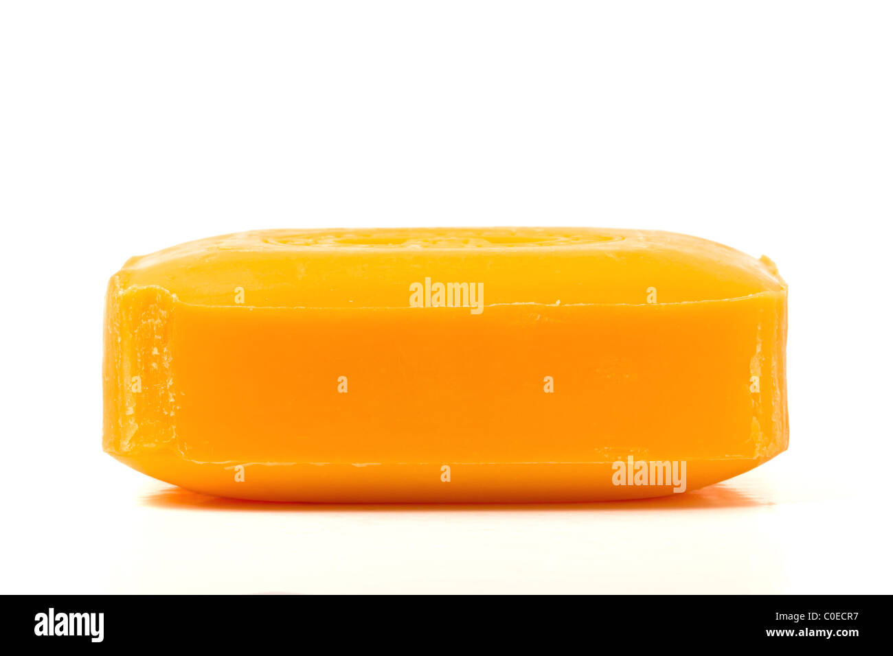 Orange medicated coal tar soap from low perspective isolated on white ...