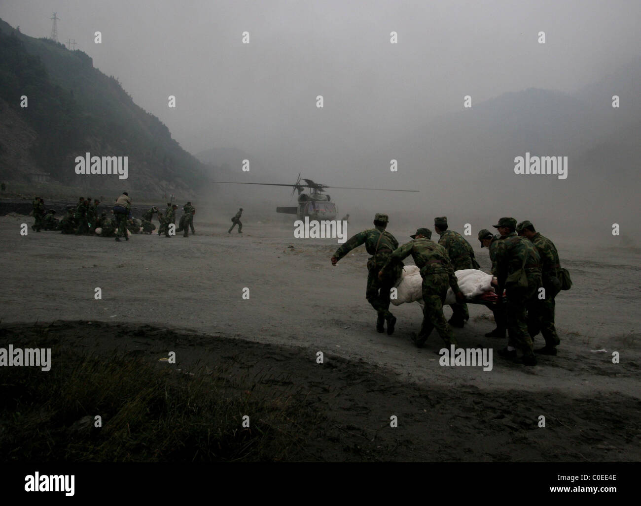 Chinese People`s Liberation Army (PLA) soldiers carry injured ...