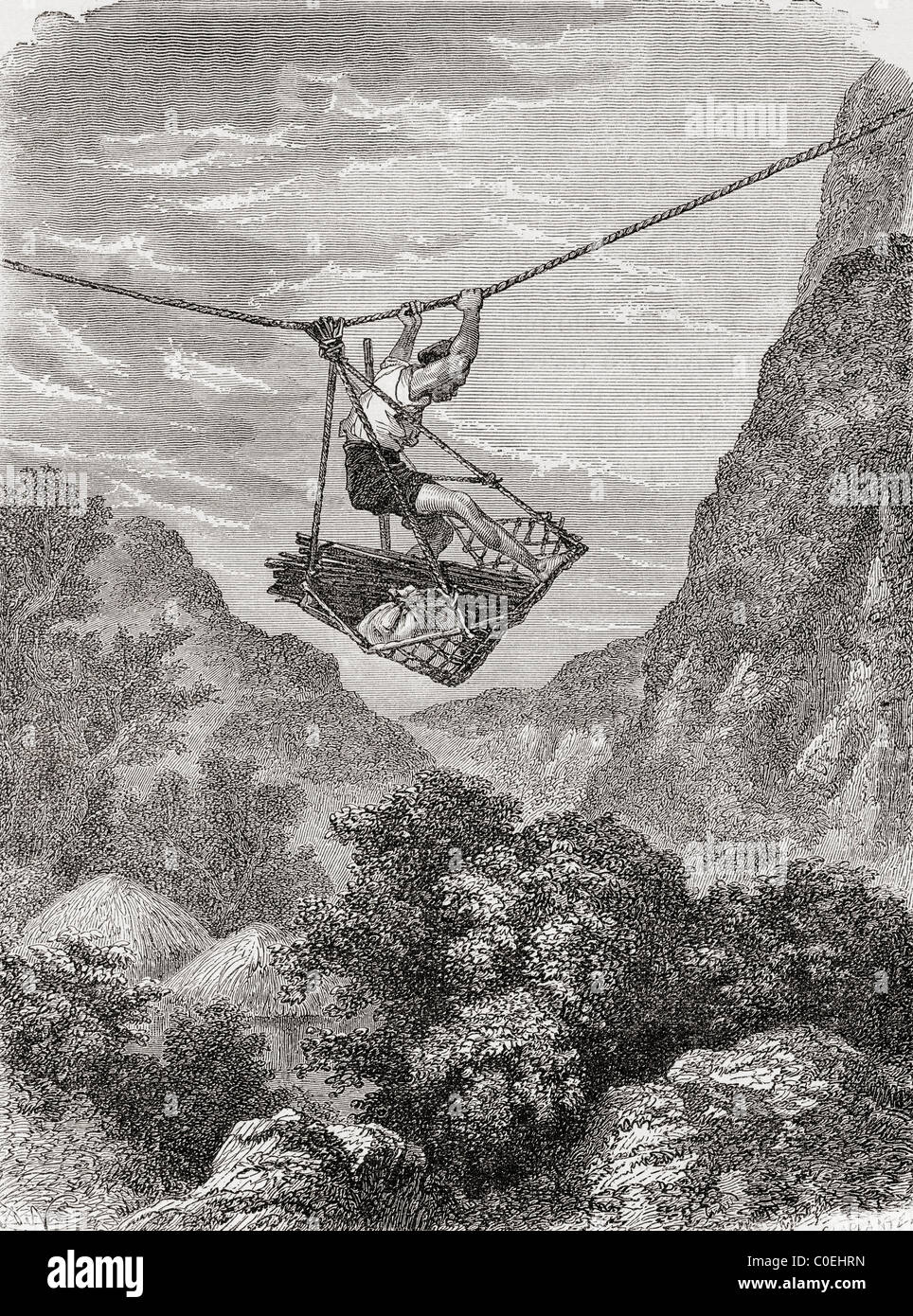 A rope suspended cradle over a valley, used as a means of transport in ...