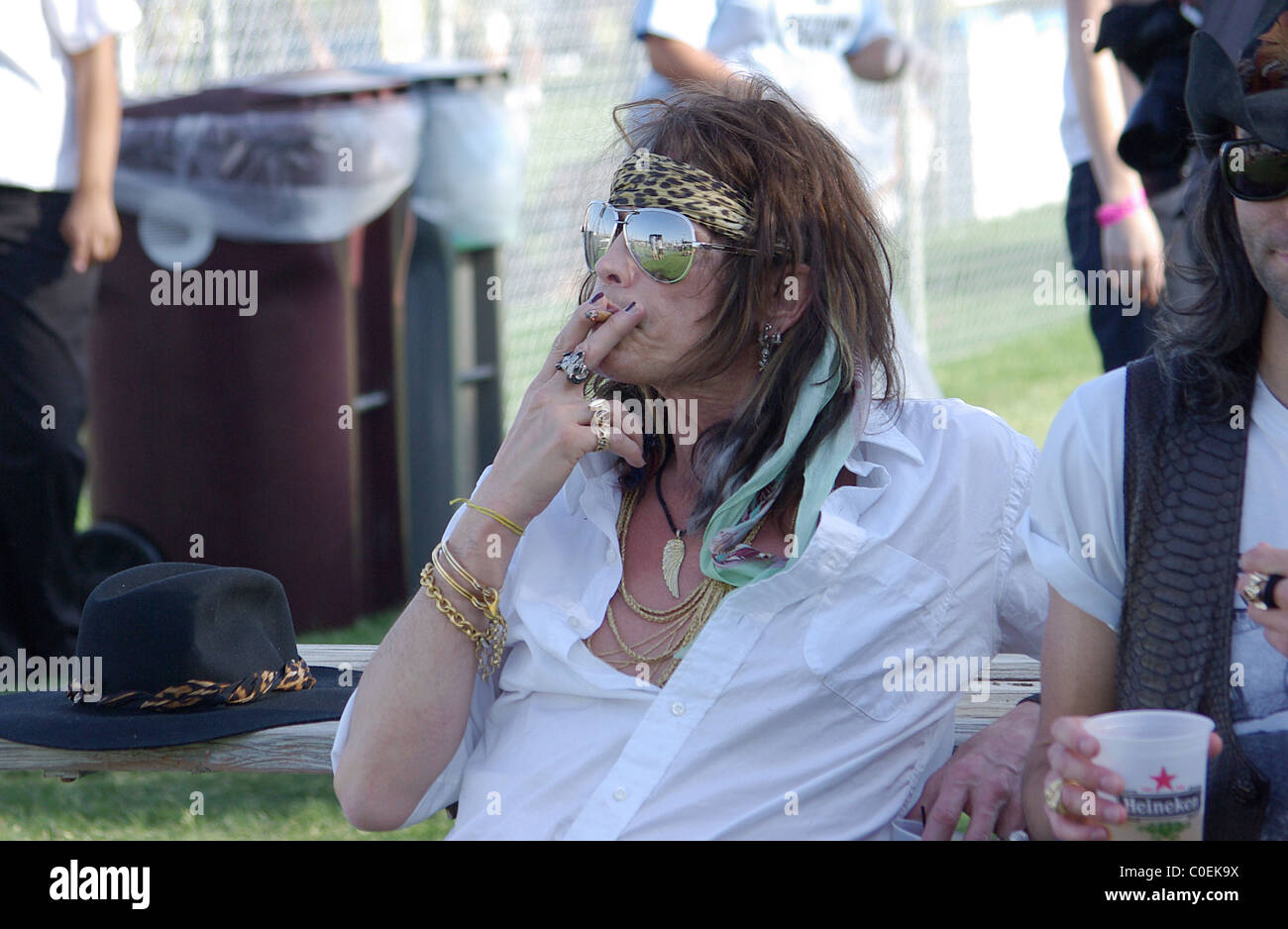 Steven Tyler of Aerosmith smoking a cigar backstage at Coachella Music ...