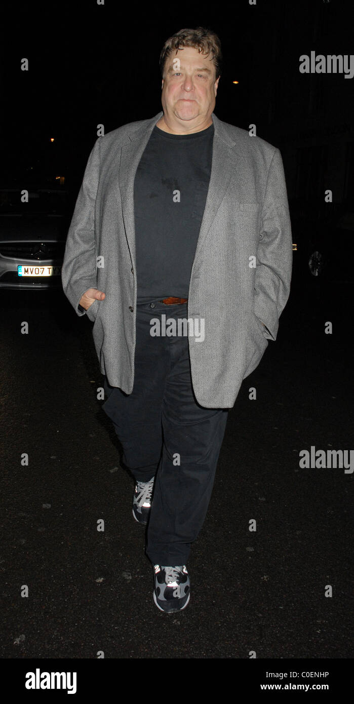 John Goodman arriving at Claridges. Although wearing dark clothing, it ...