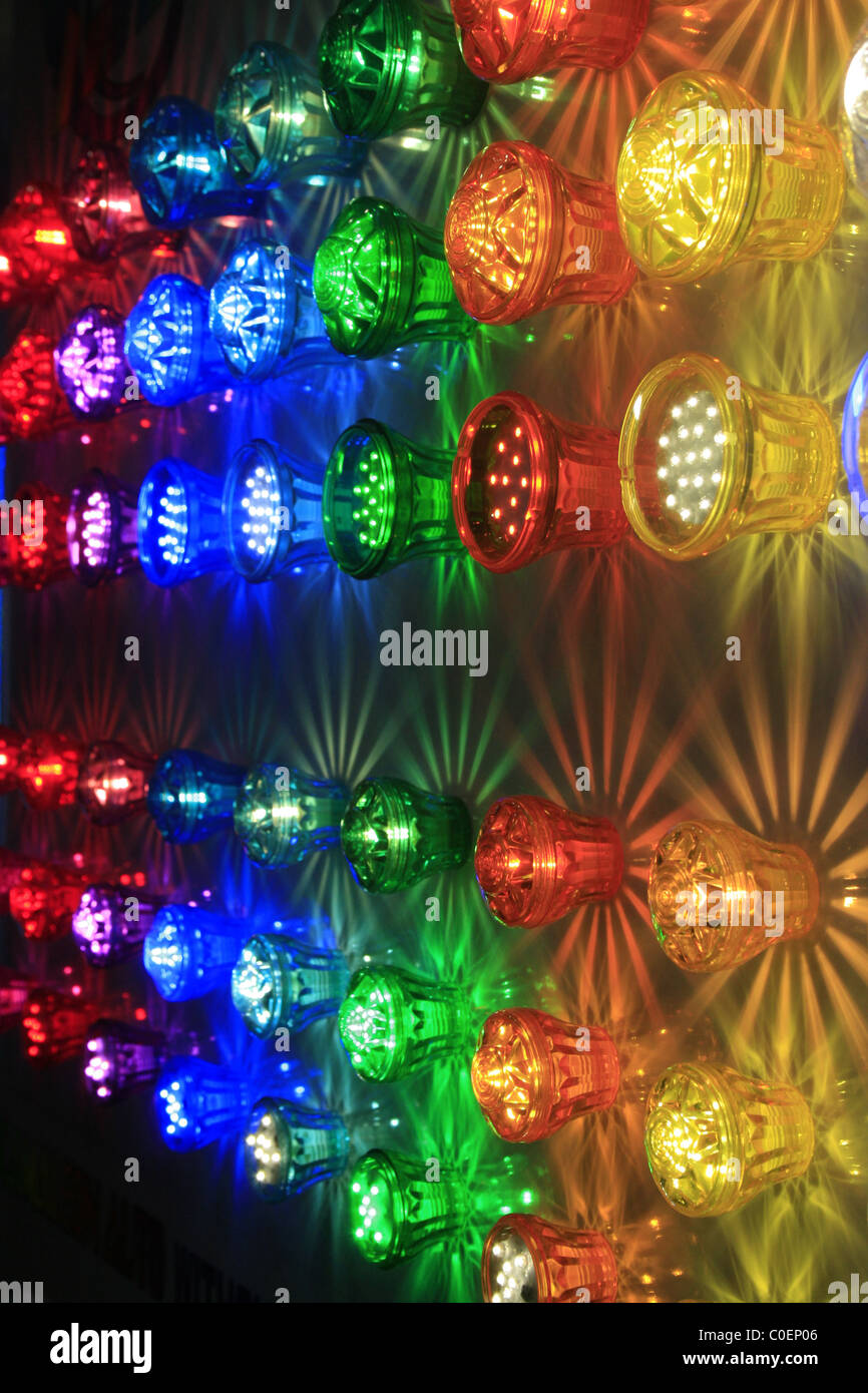 rows of colourful flashing lights Stock Photo - Alamy