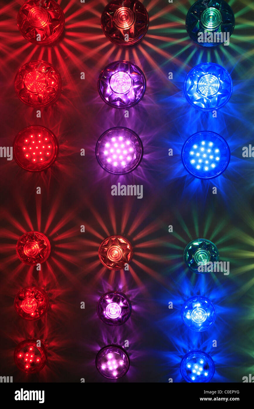 rows of colourful flashing lights Stock Photo - Alamy