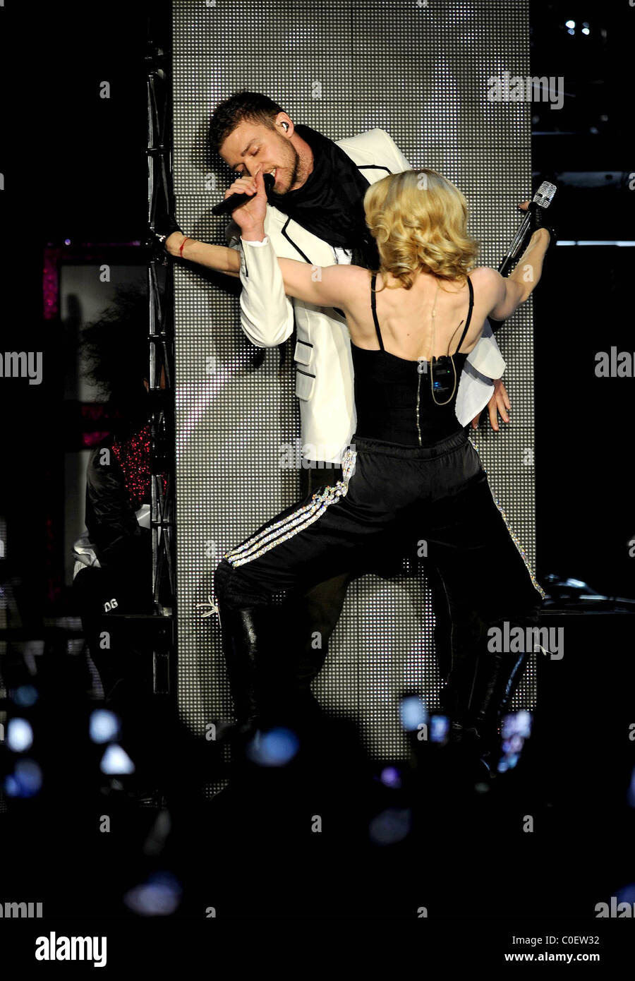 Madonna and Justin Timberlake performing at a thank you show for fans ...