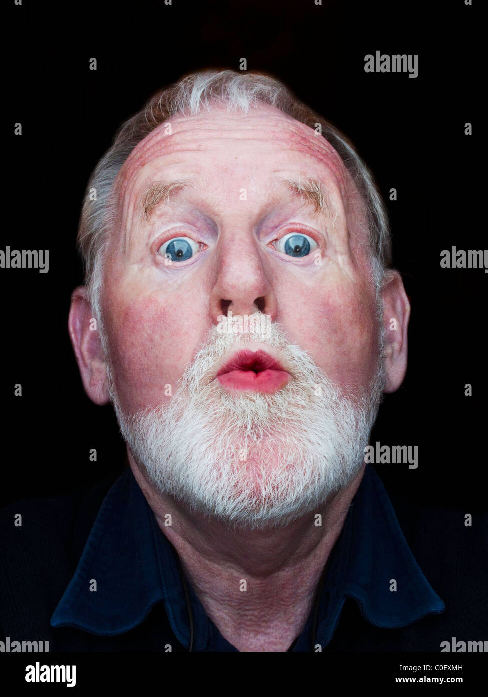 OLD MAN EXAGGERATED PUCKERING UP FOR KISS Stock Photo - Alamy