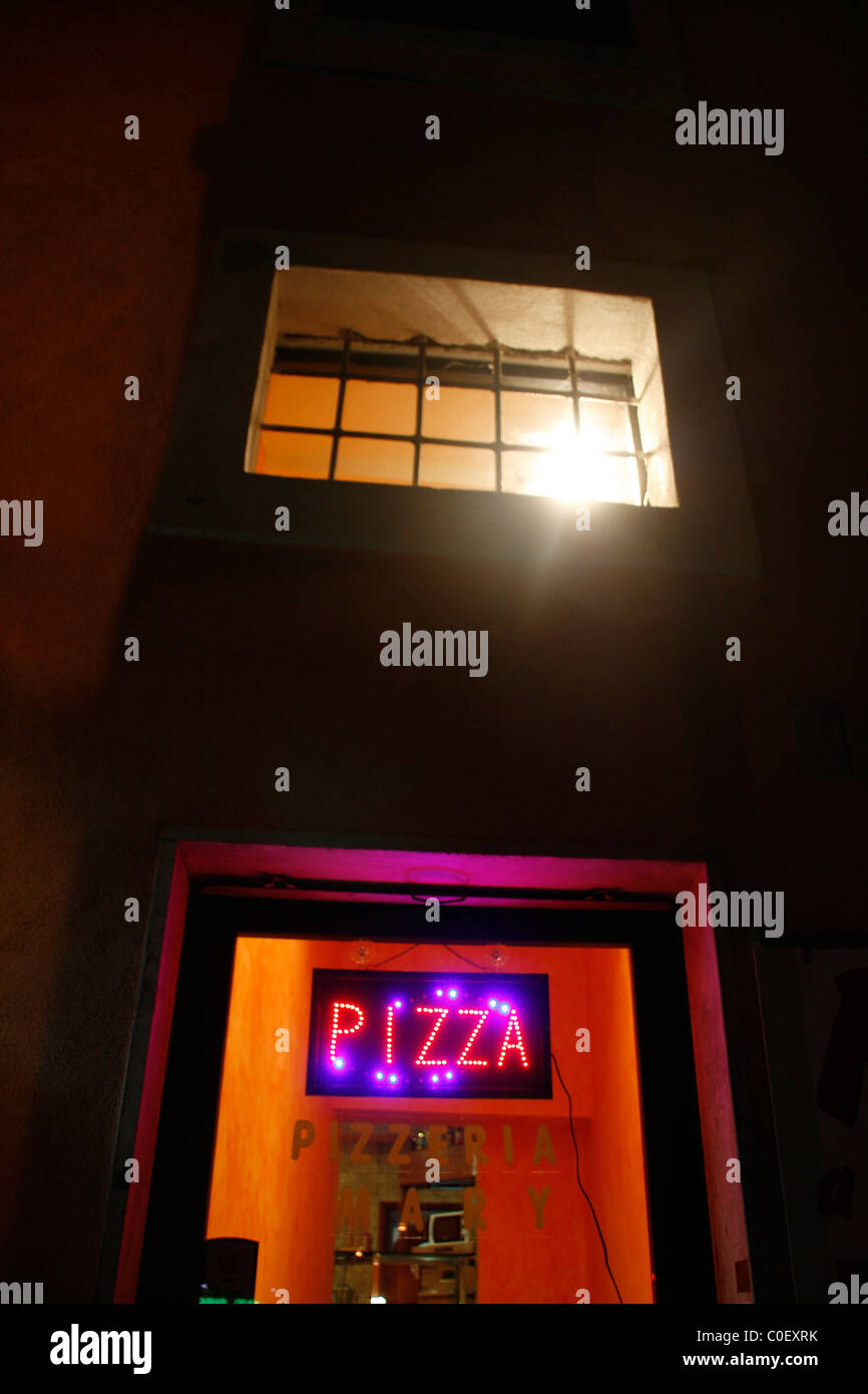 pizza sign in rome at night Stock Photo - Alamy