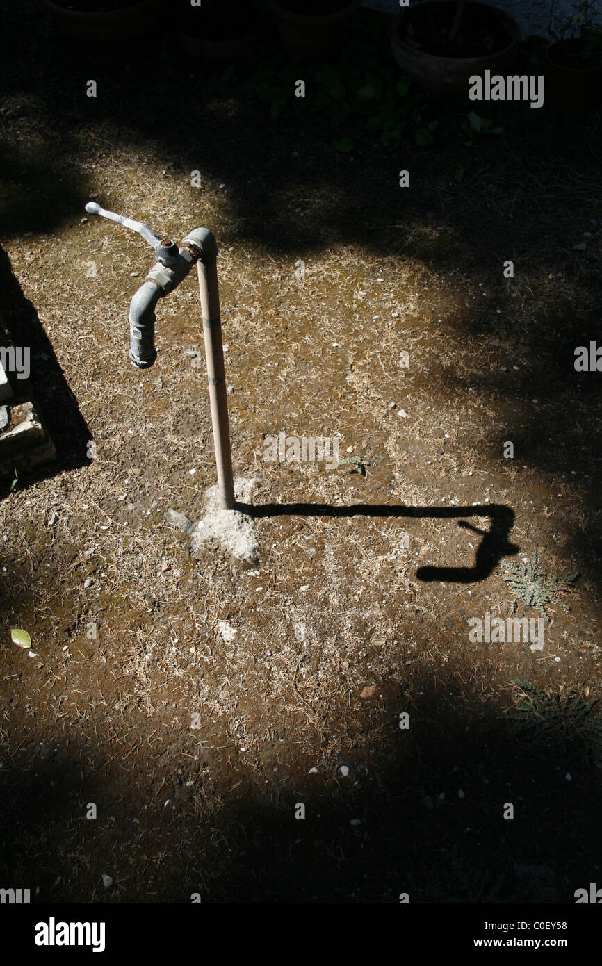 one single water tap outdoors Stock Photo - Alamy