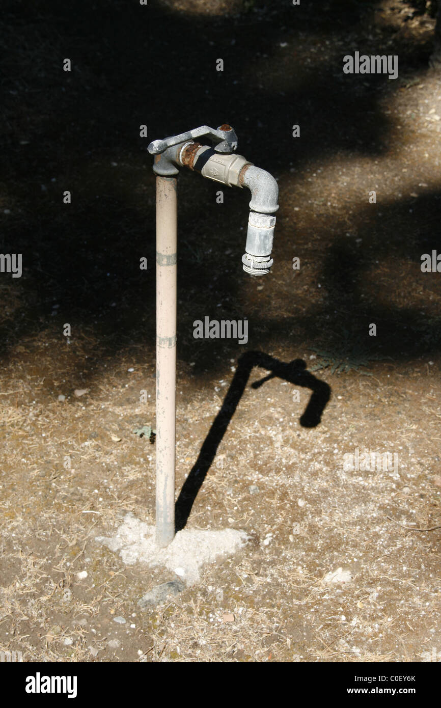 one single water tap outdoors Stock Photo - Alamy