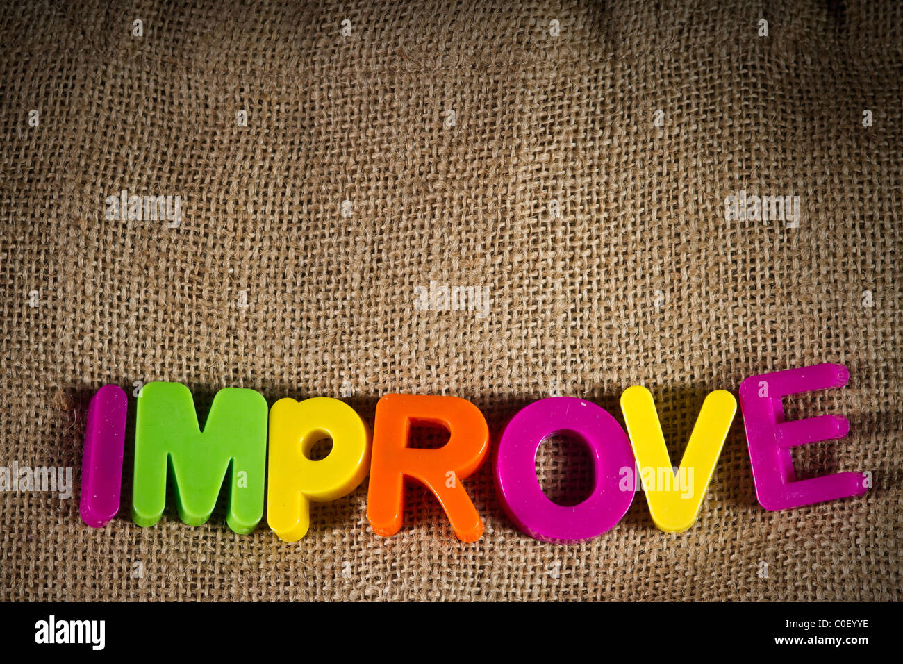 Improve Dictionary Definition Low key close up Stock Photo - Alamy