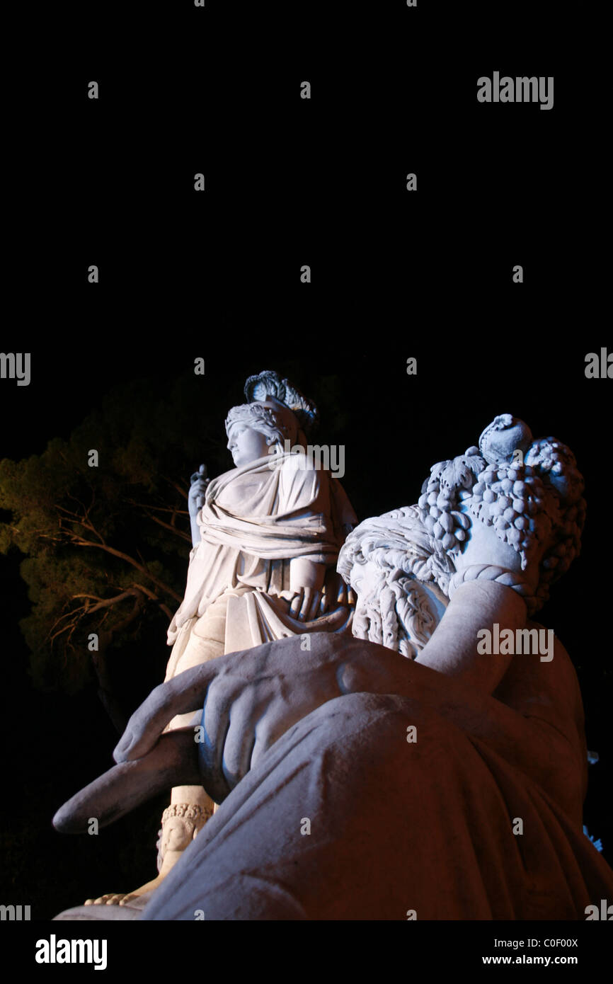 statue in piazza del popolo square at night, rome Stock Photo - Alamy