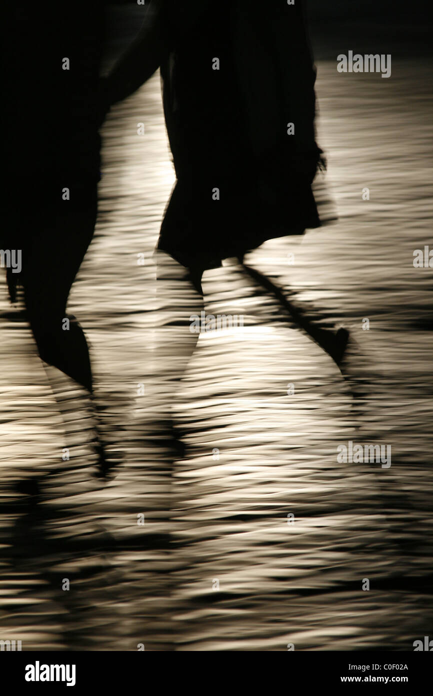 people walking in street at night Stock Photo - Alamy
