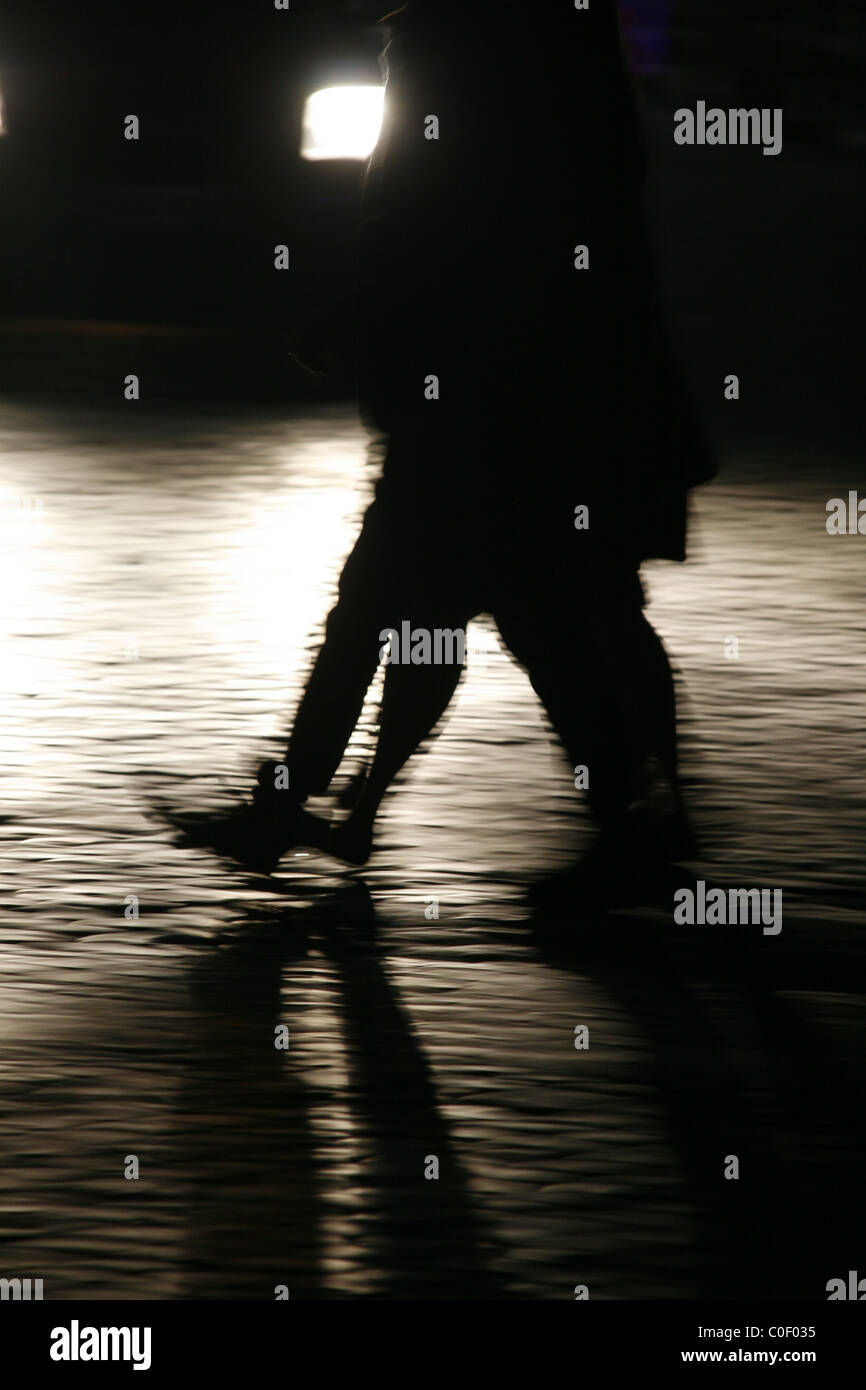 people walking in street at night Stock Photo - Alamy