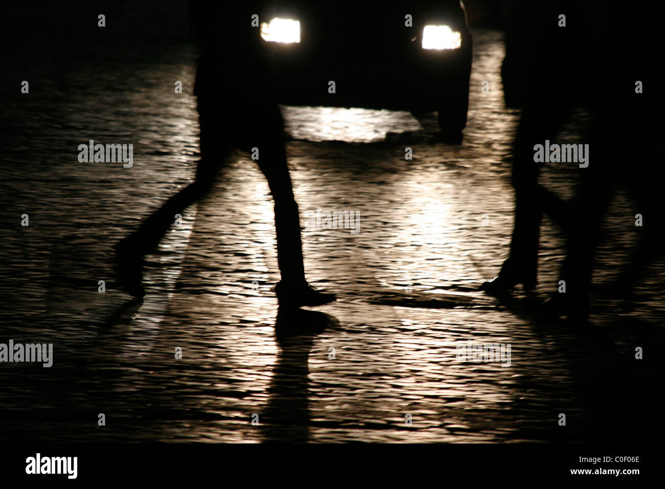 people walking in street at night Stock Photo - Alamy