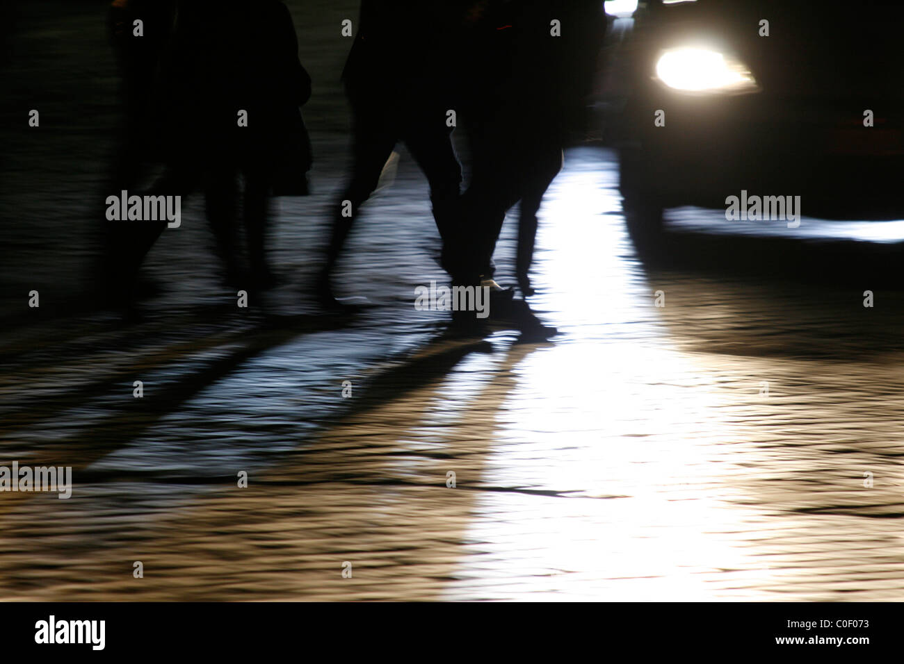 people walking in street at night Stock Photo - Alamy