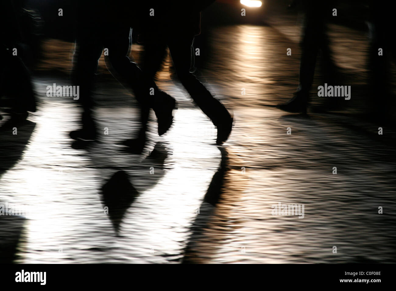people walking in street at night Stock Photo - Alamy