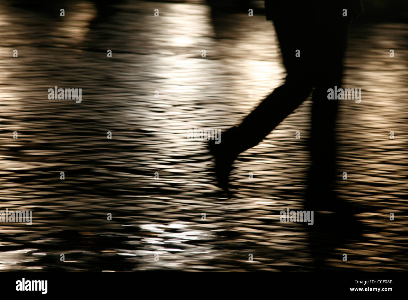 people walking in street at night Stock Photo - Alamy
