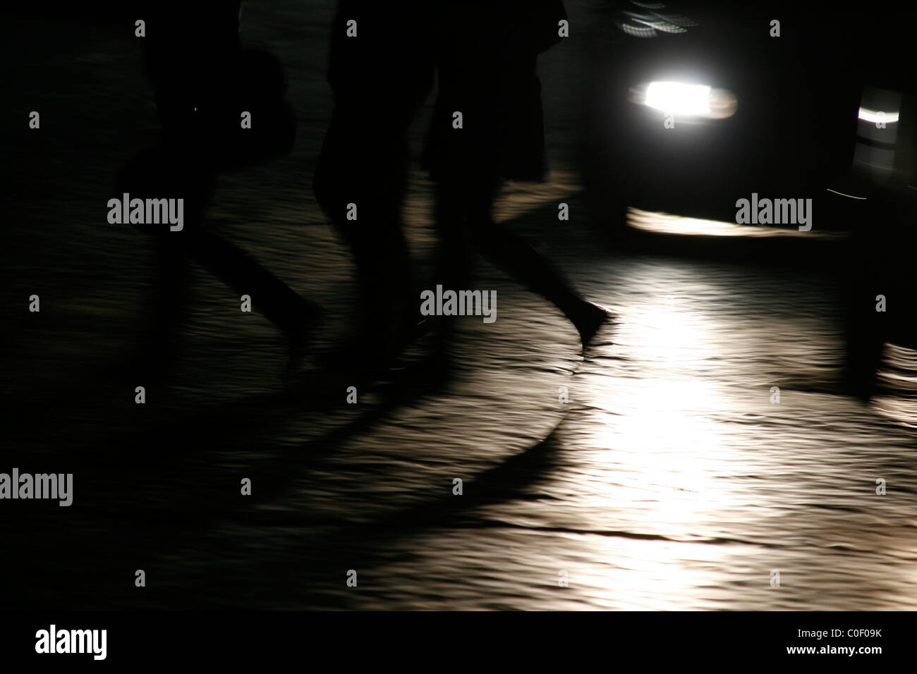 people walking in street at night Stock Photo - Alamy
