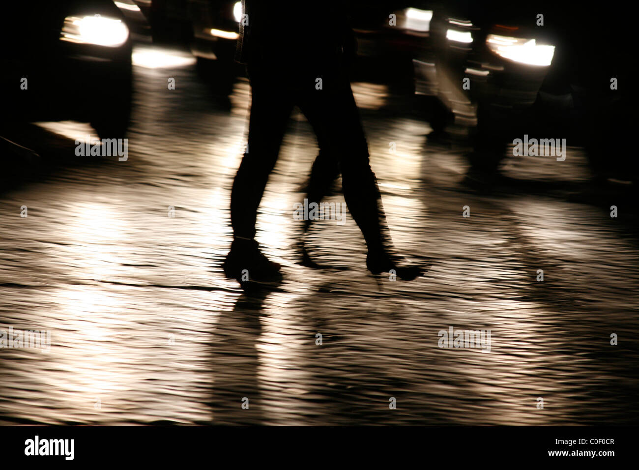 people walking in street at night Stock Photo - Alamy