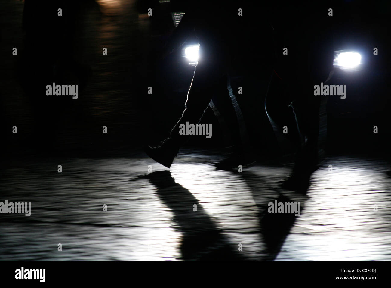 people walking in street at night Stock Photo - Alamy