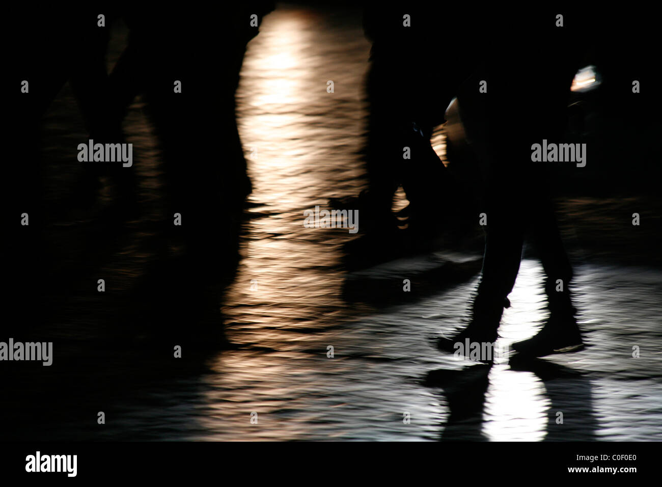 people walking in street at night Stock Photo - Alamy