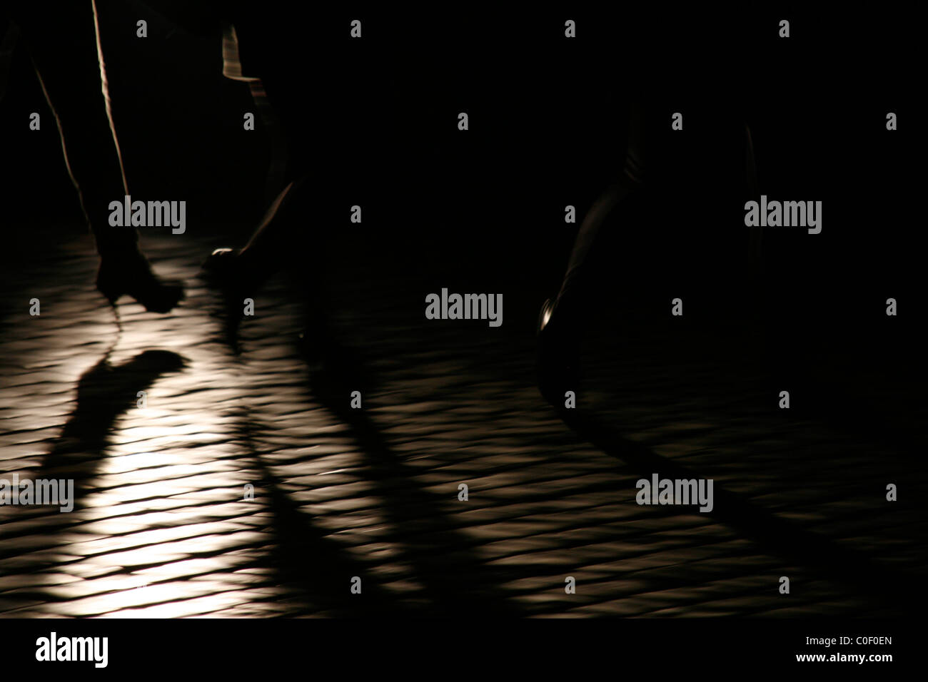 people walking in street at night Stock Photo - Alamy