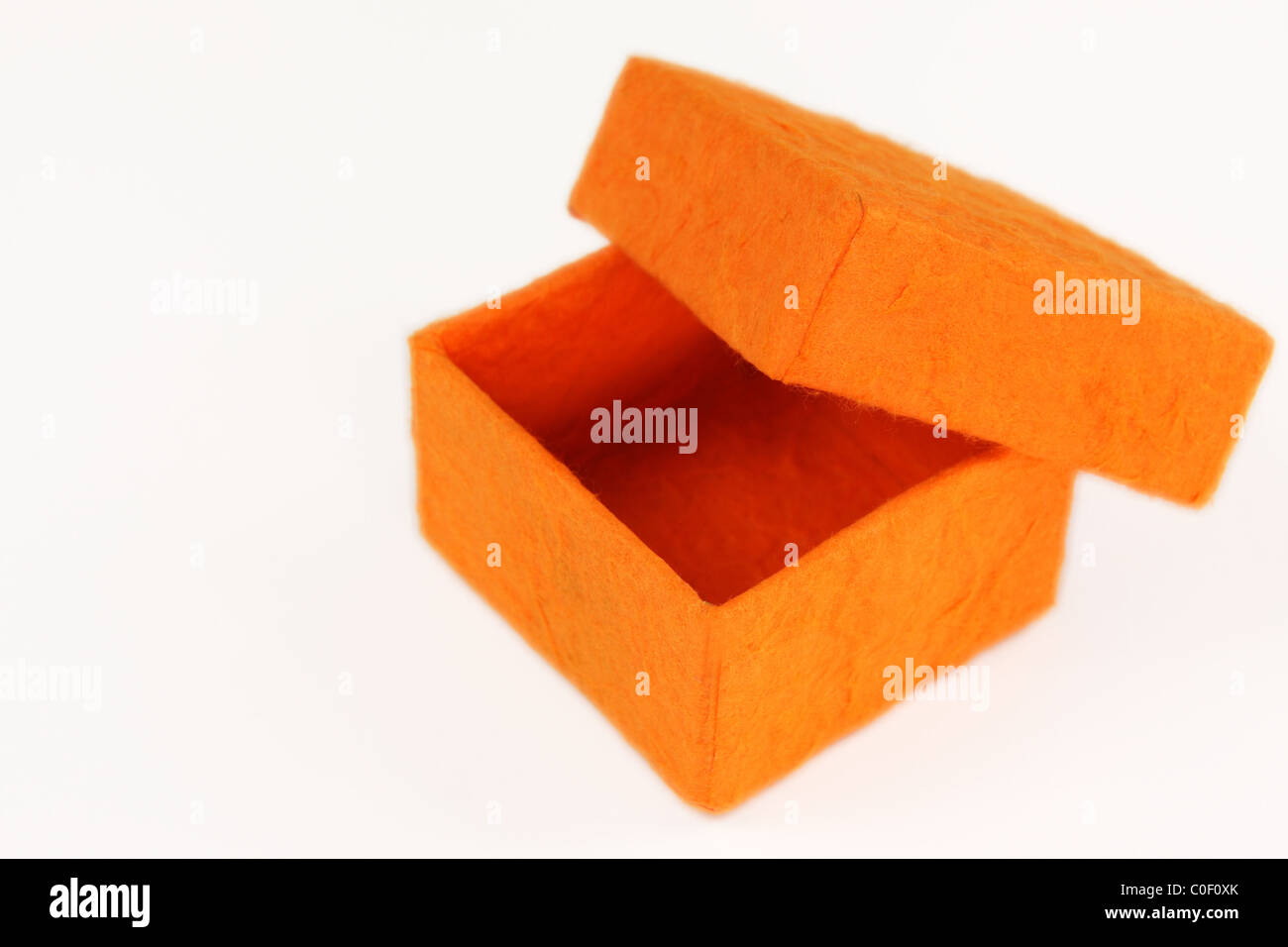 Orange gift box isolated on white background Stock Photo - Alamy