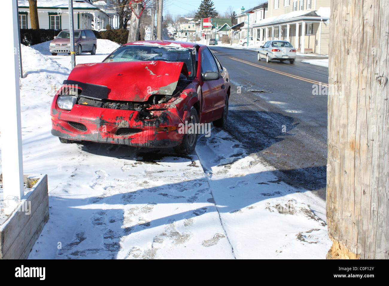 red car damaged in car crash, front view Stock Photo - Alamy