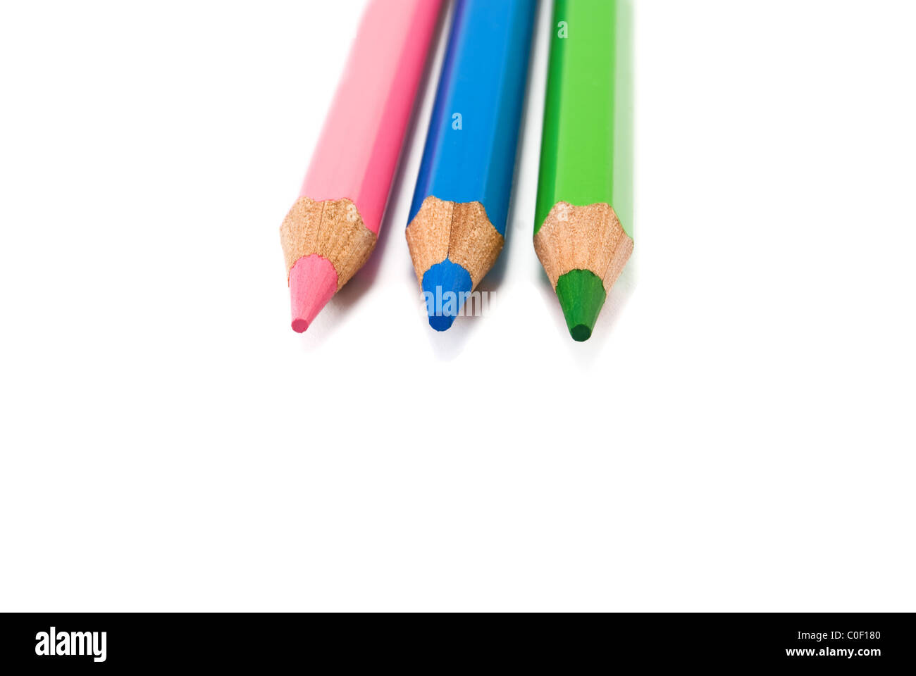 three pencils isolated on a white background Stock Photo - Alamy