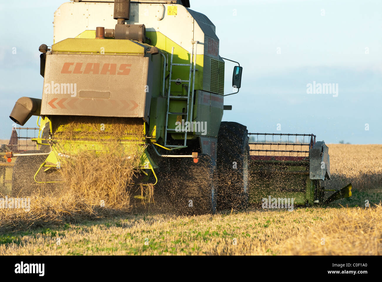 Combine harvester at work summer,Warwickshire, England Stock Photo - Alamy