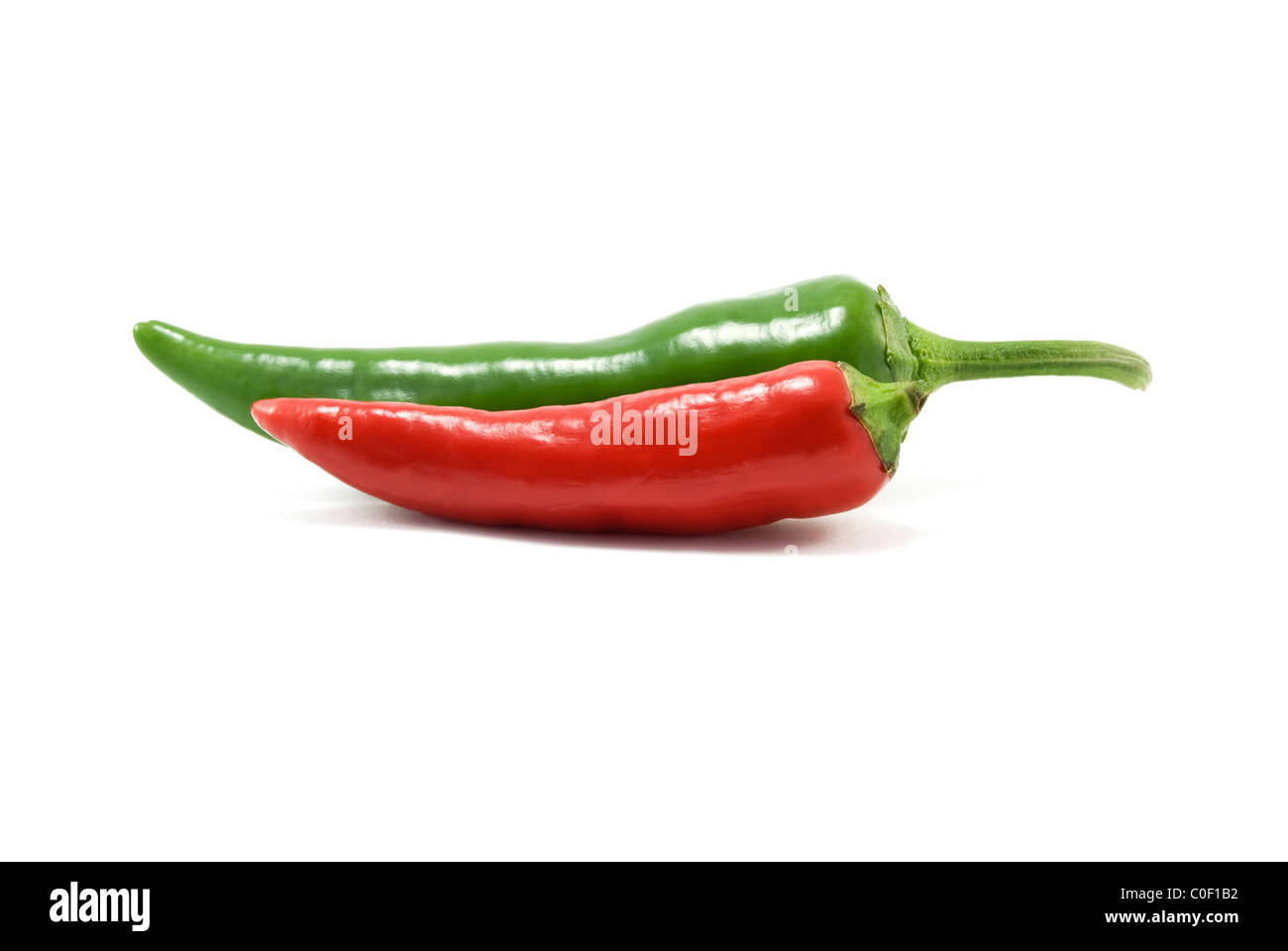 two peppers isolated on a white background Stock Photo - Alamy