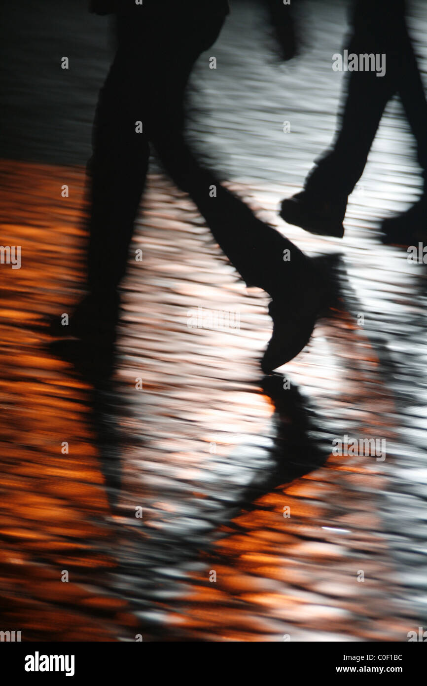 people walking in street at night Stock Photo - Alamy