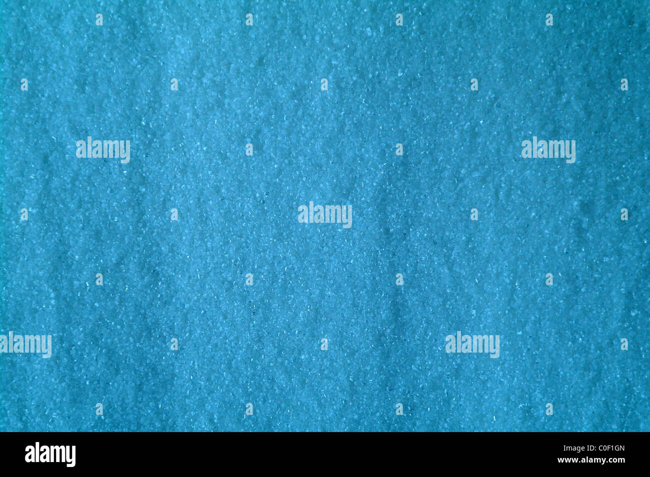 Blue background from granulated sugar Stock Photo - Alamy