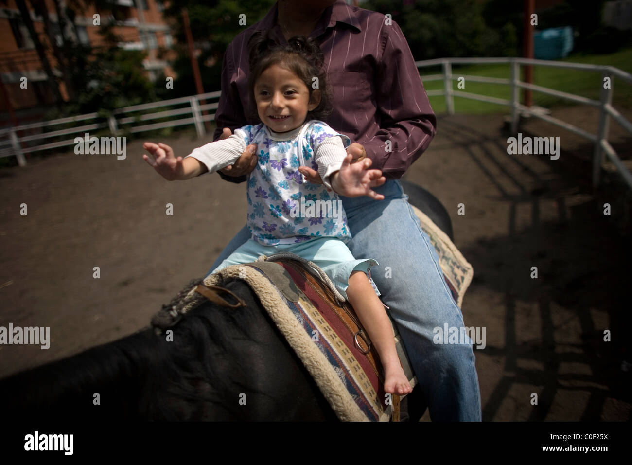A girl who suffers infantile cerebral paralysis and congenital ...