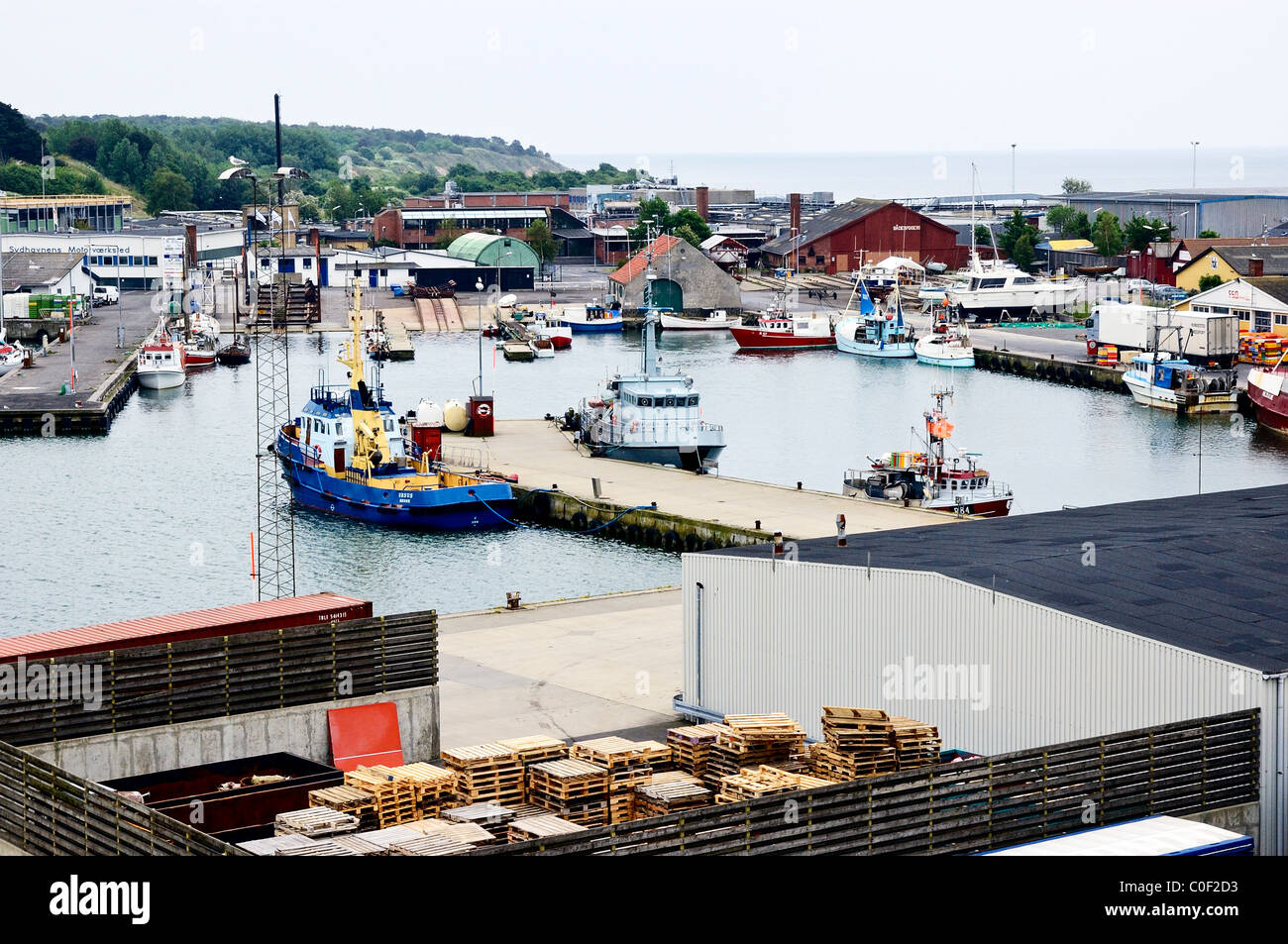 Fishing boats moored in the port of Ronne the capital of the island of ...
