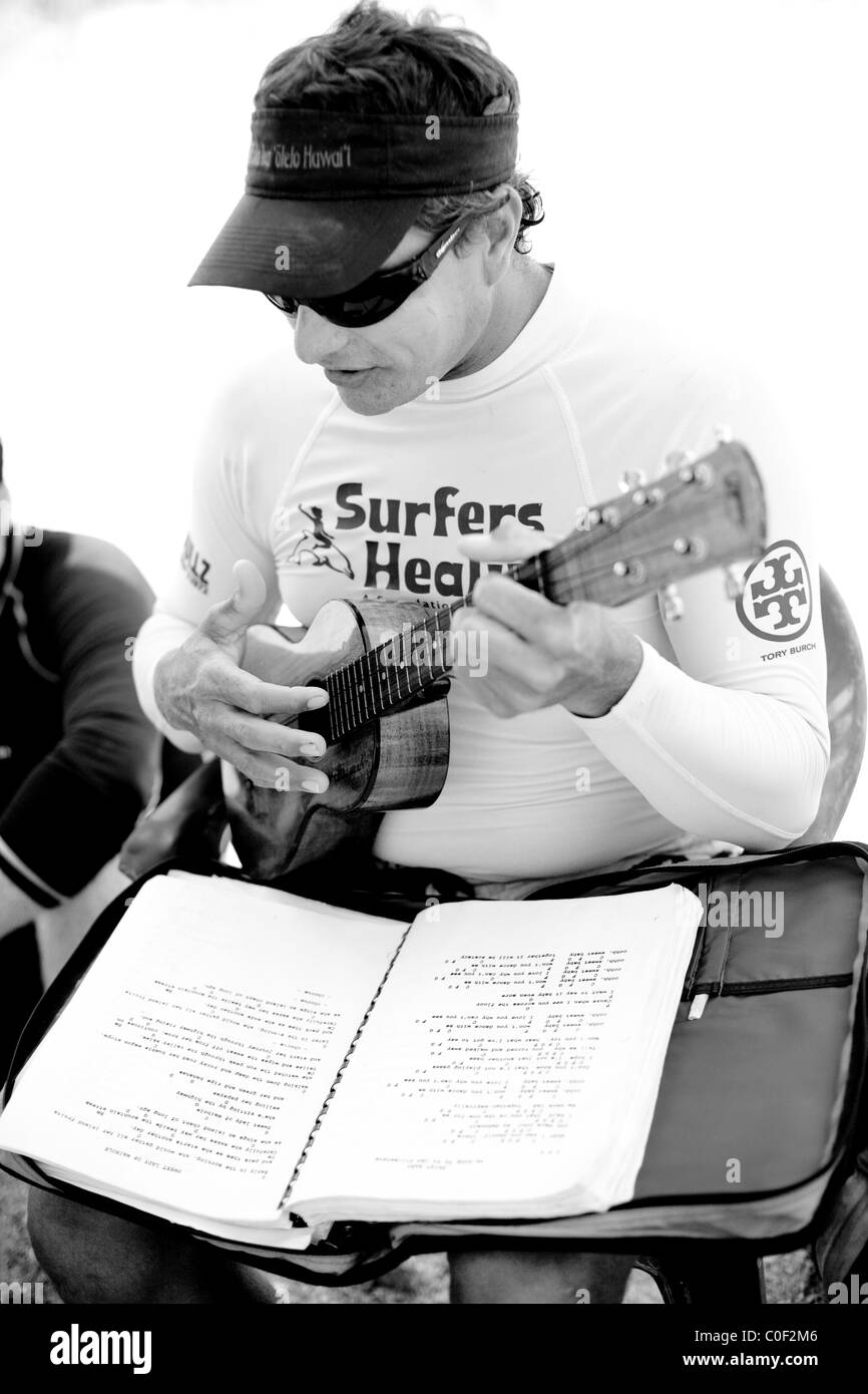 Instructor plays the ukulele at Surfer's Healing camp in Wrightsville ...
