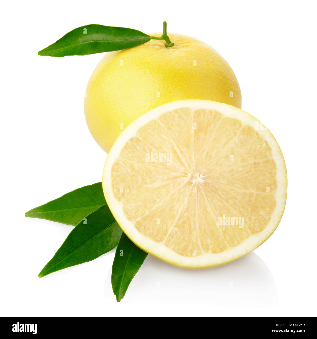 Grapefruit with leaves isolated on white Stock Photo - Alamy