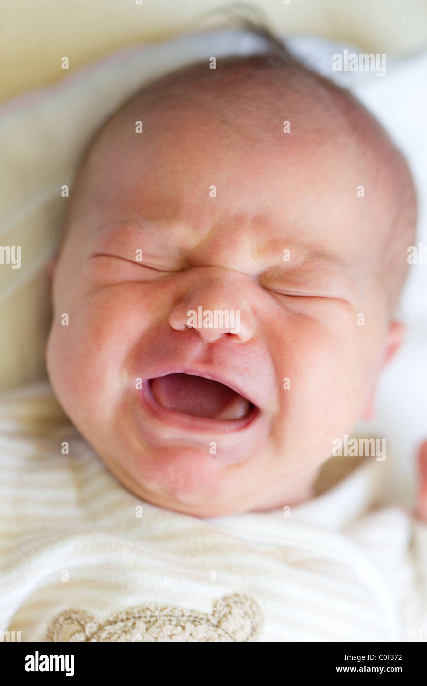 crying newborn baby Stock Photo - Alamy