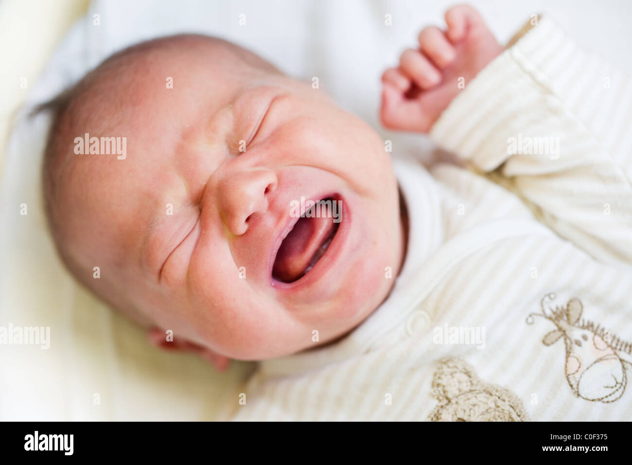 crying newborn baby Stock Photo - Alamy