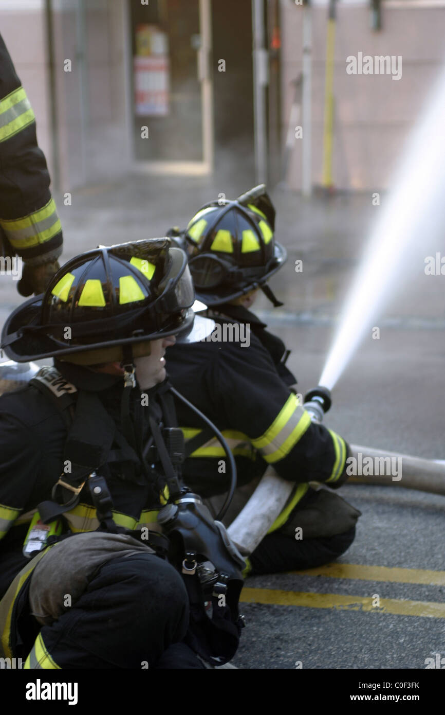 Firefighters at the scene of a fire in new Jersey Stock Photo - Alamy