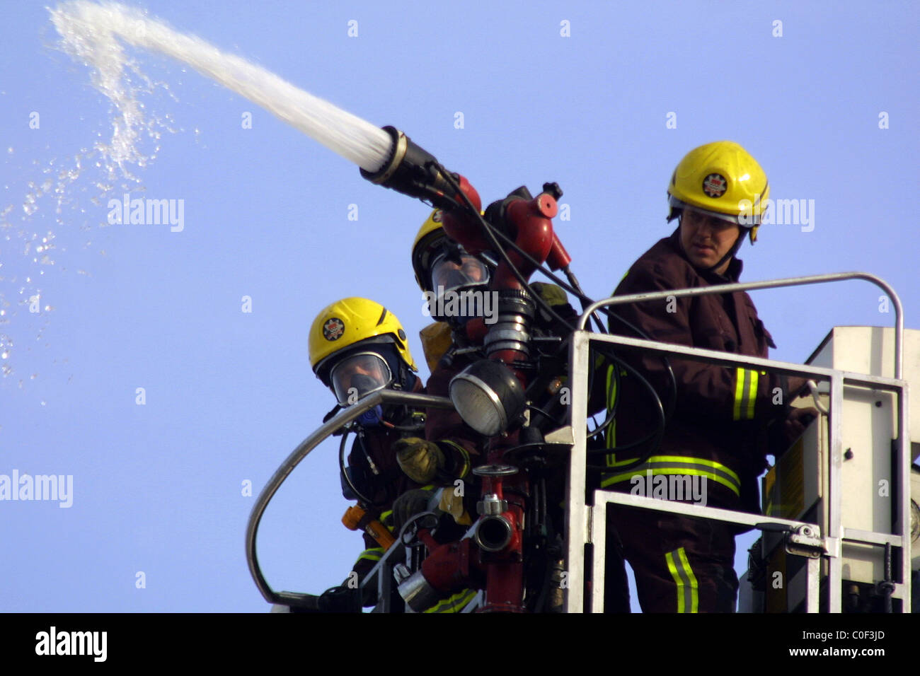 Fireman using water hi-res stock photography and images - Alamy