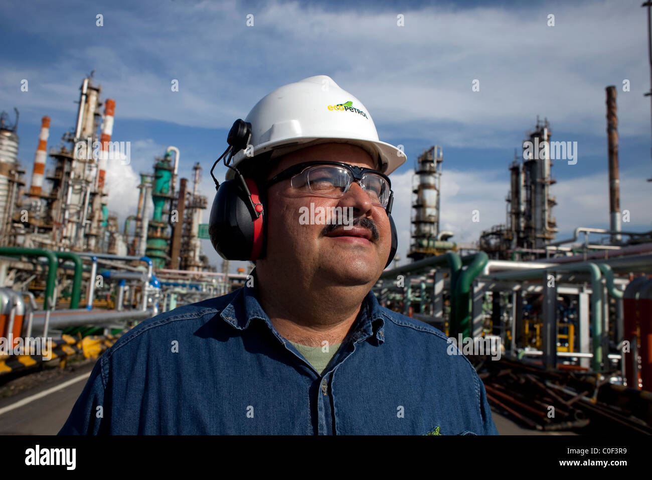 Men work at an oil refinery in Barrancabermeja, Colombia Stock Photo ...